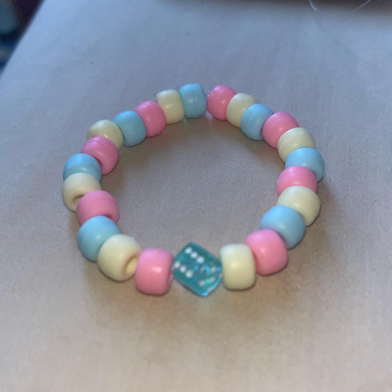 handmade pride pan kandi with lil dice