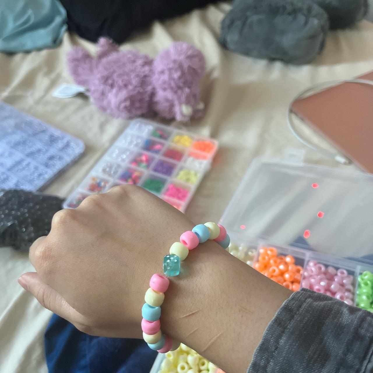 handmade pride pan kandi with lil dice
