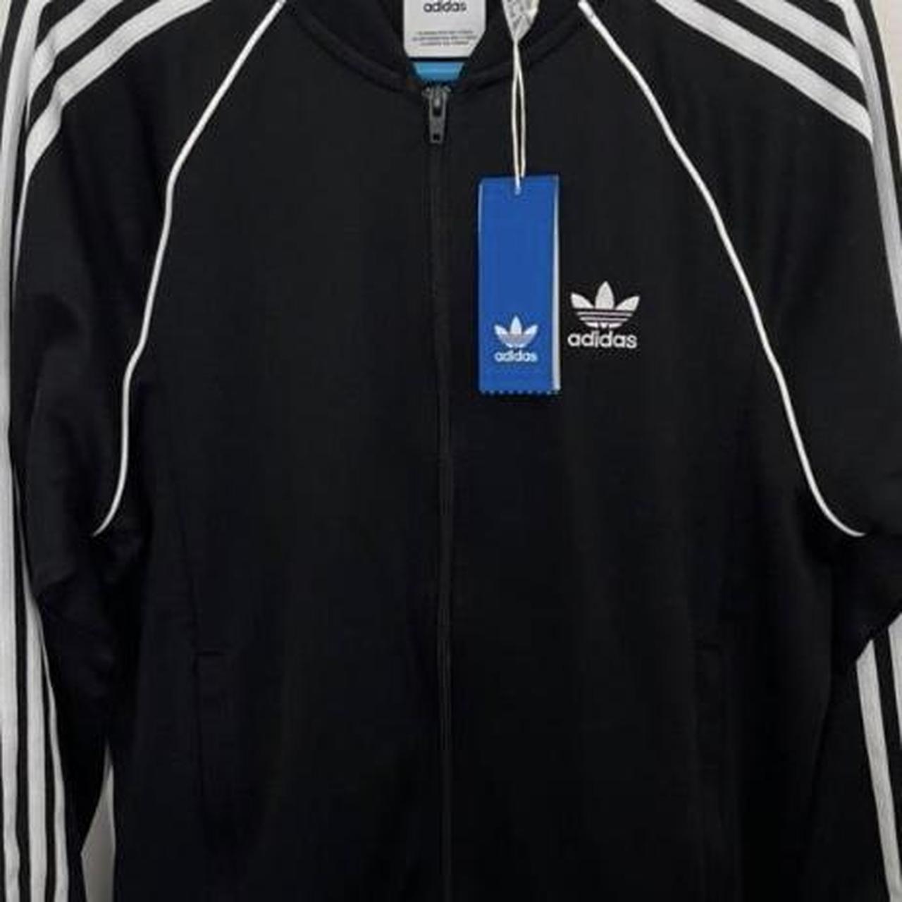 Adidas SST tracksuit top half only. Size 12 will fit... - Depop