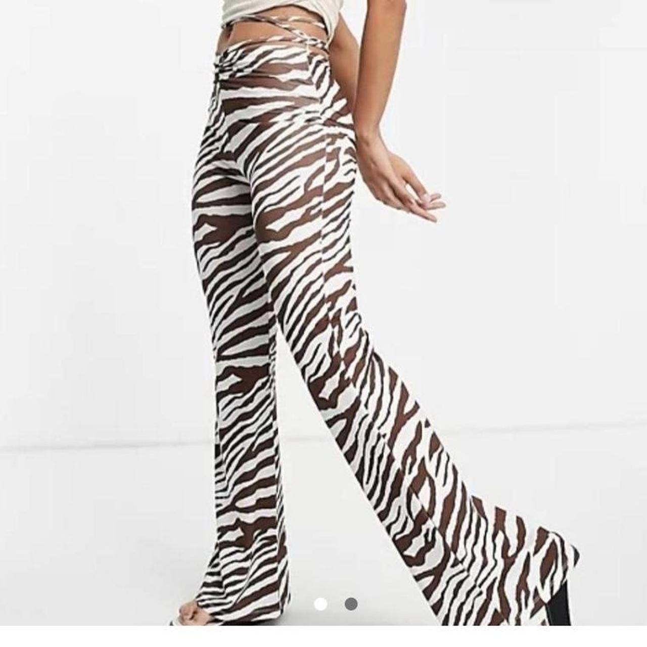 Brown zebra pattern Bershka flares. Tie up cord... - Depop