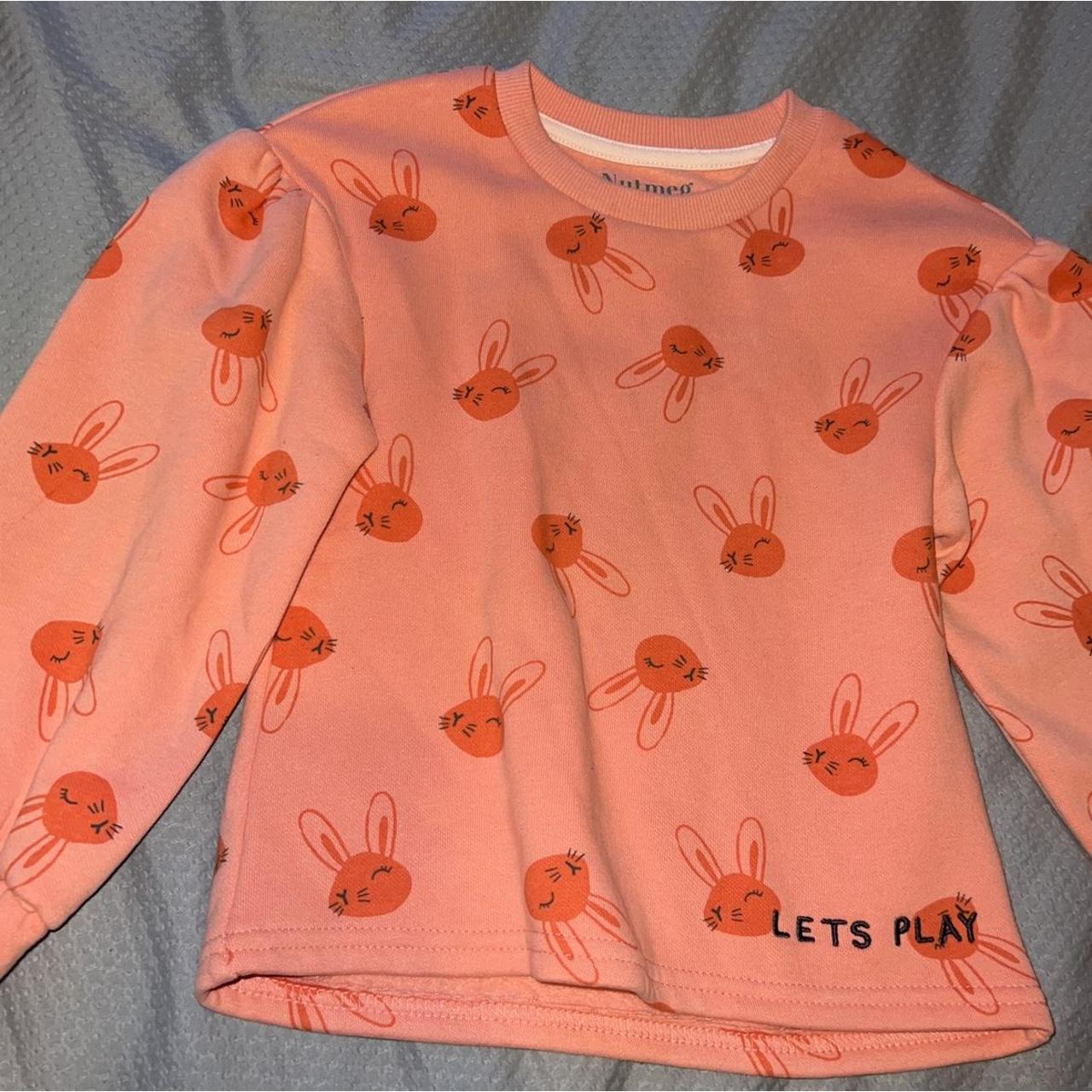 Girls nutmeg, peachy pink rabbit “let’s play” slogan... - Depop