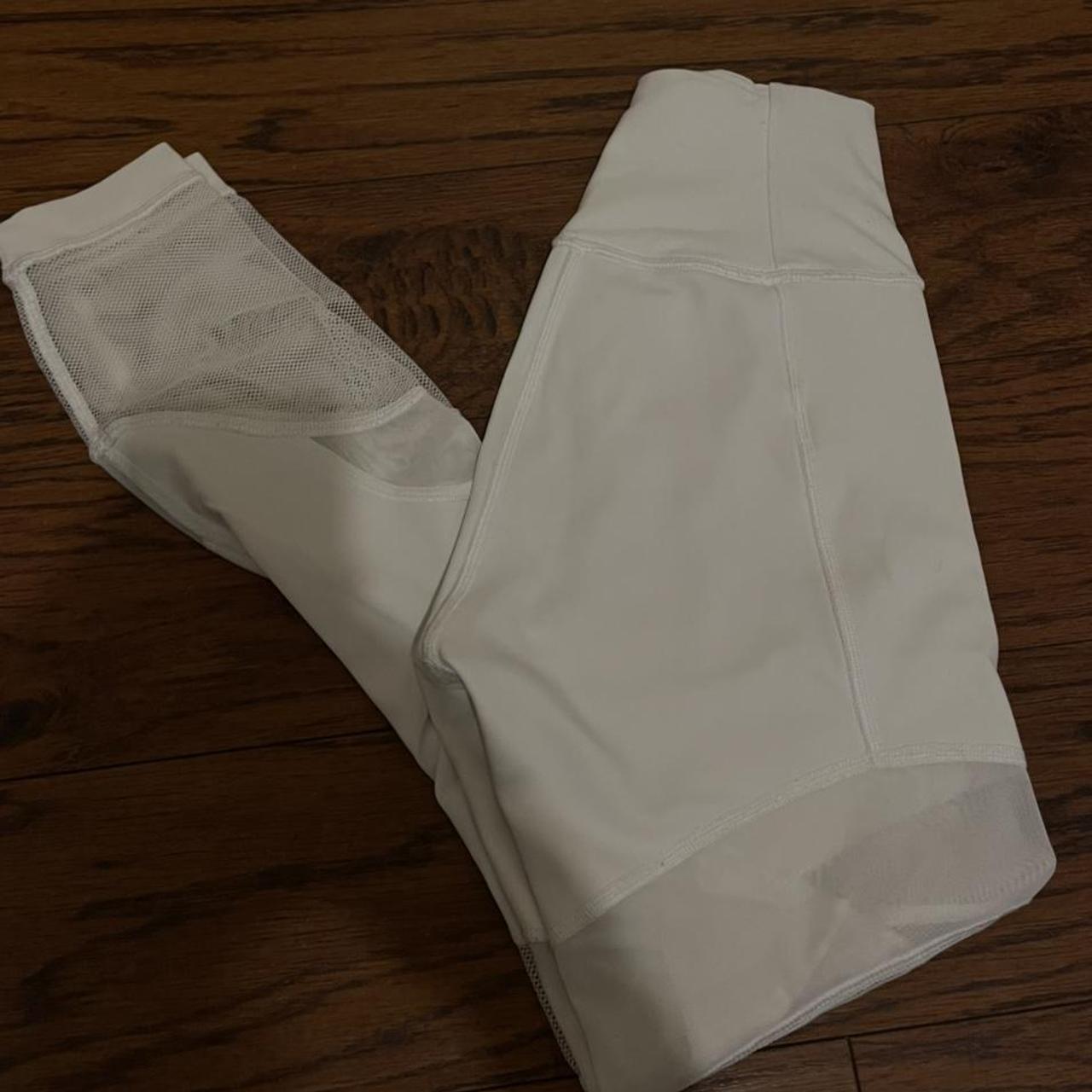 White Lululemon leggings with mesh openings and... - Depop