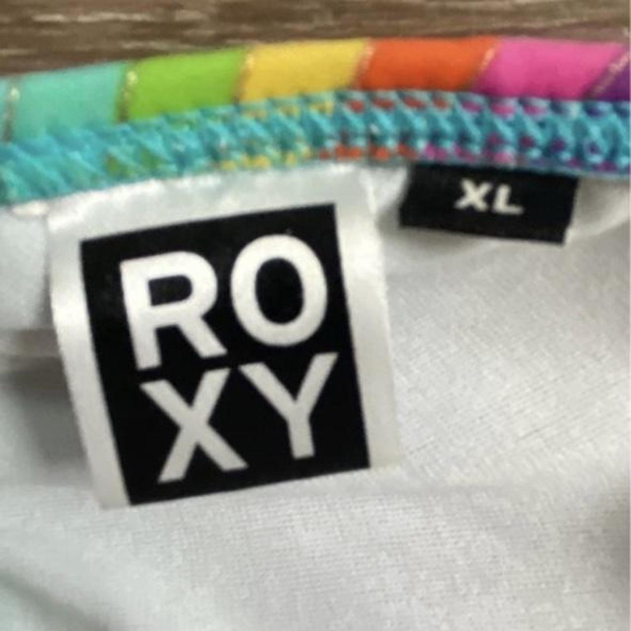 item: Vintage Roxy bikini top features: tie neck... - Depop