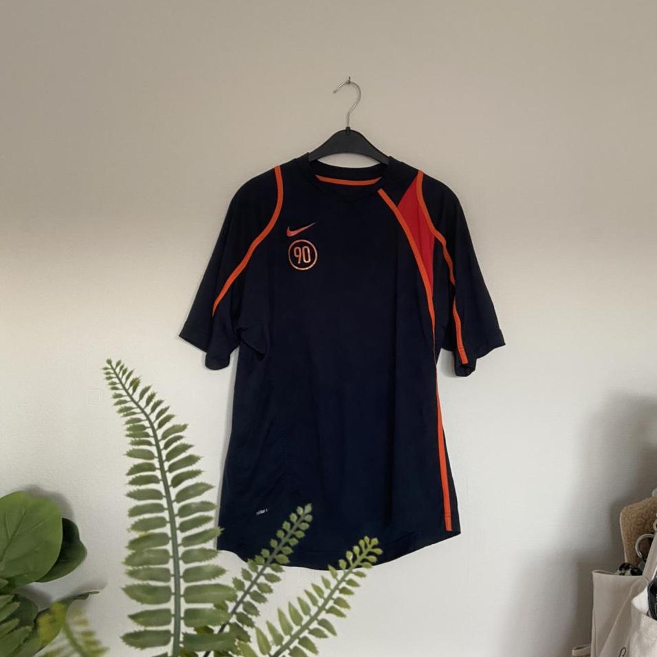 Black & orange/ red football top Excellent... - Depop