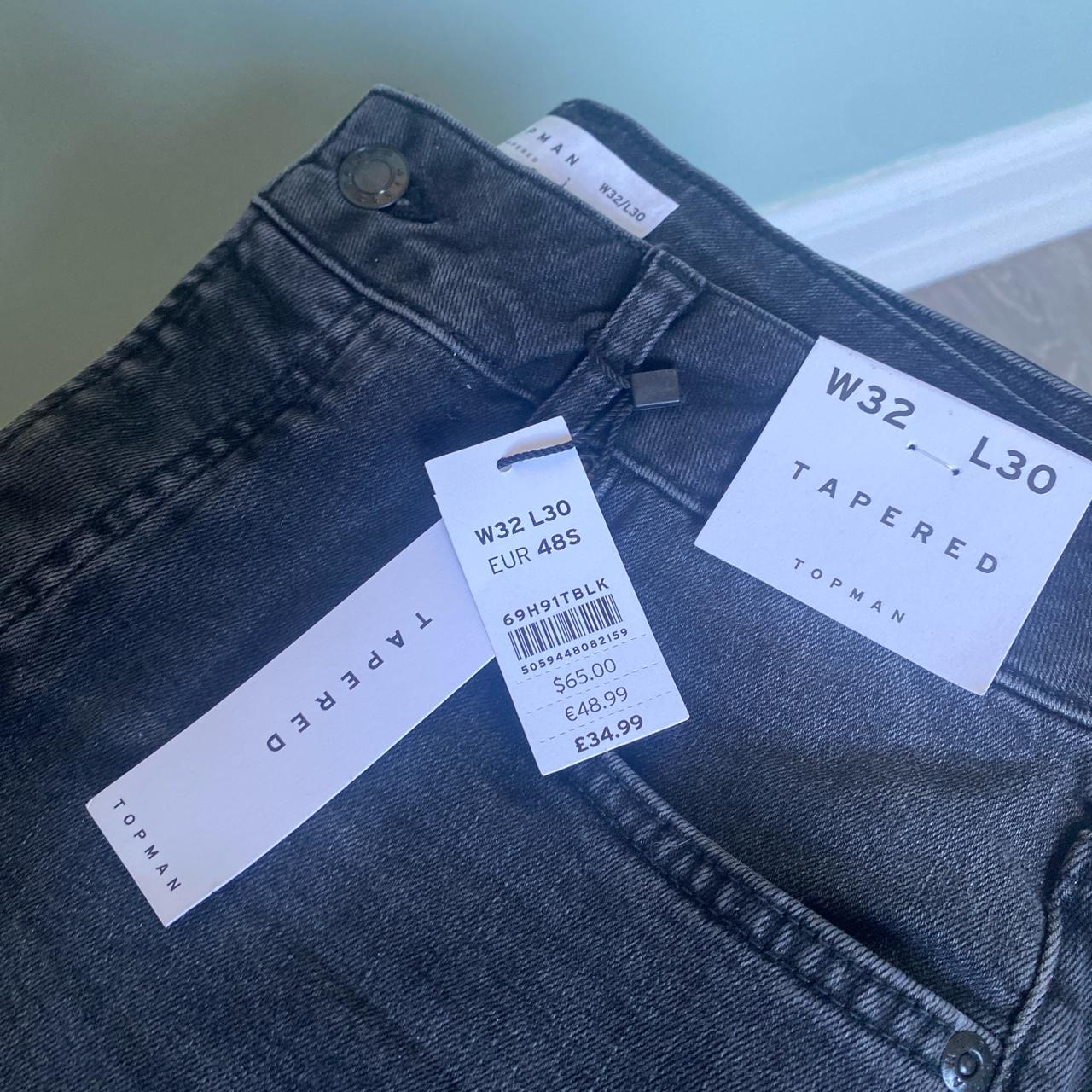 Men's washed out black tapered topman jeans, brand... - Depop