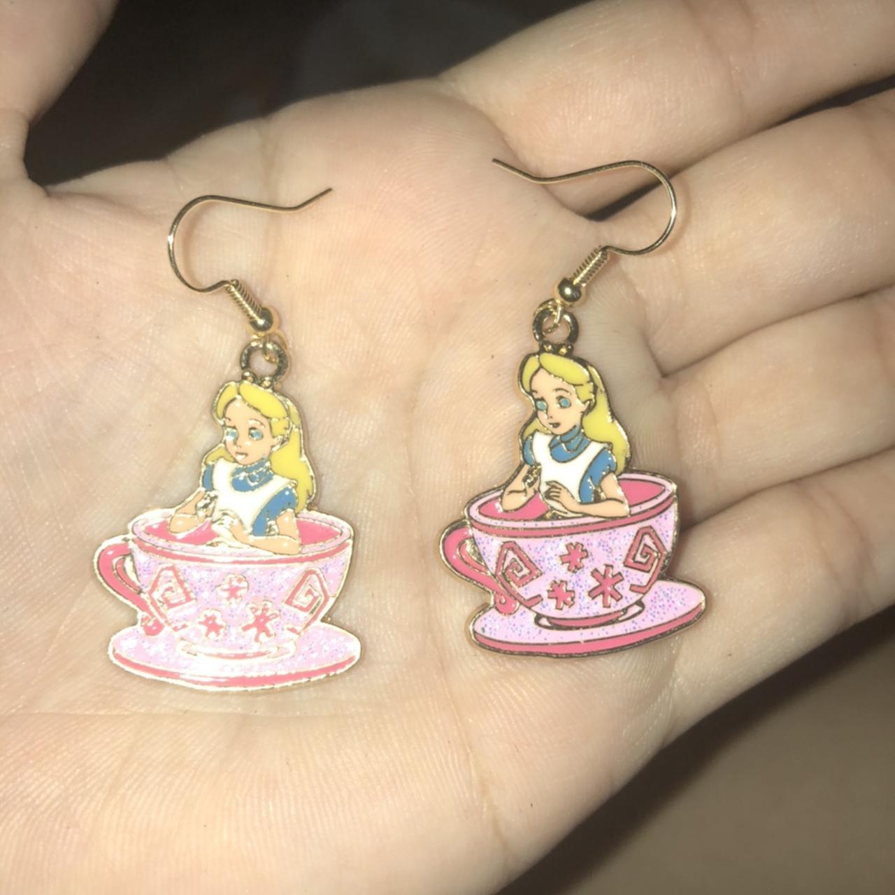Alice in wonderland earrings. #aliceinwonderland... - Depop