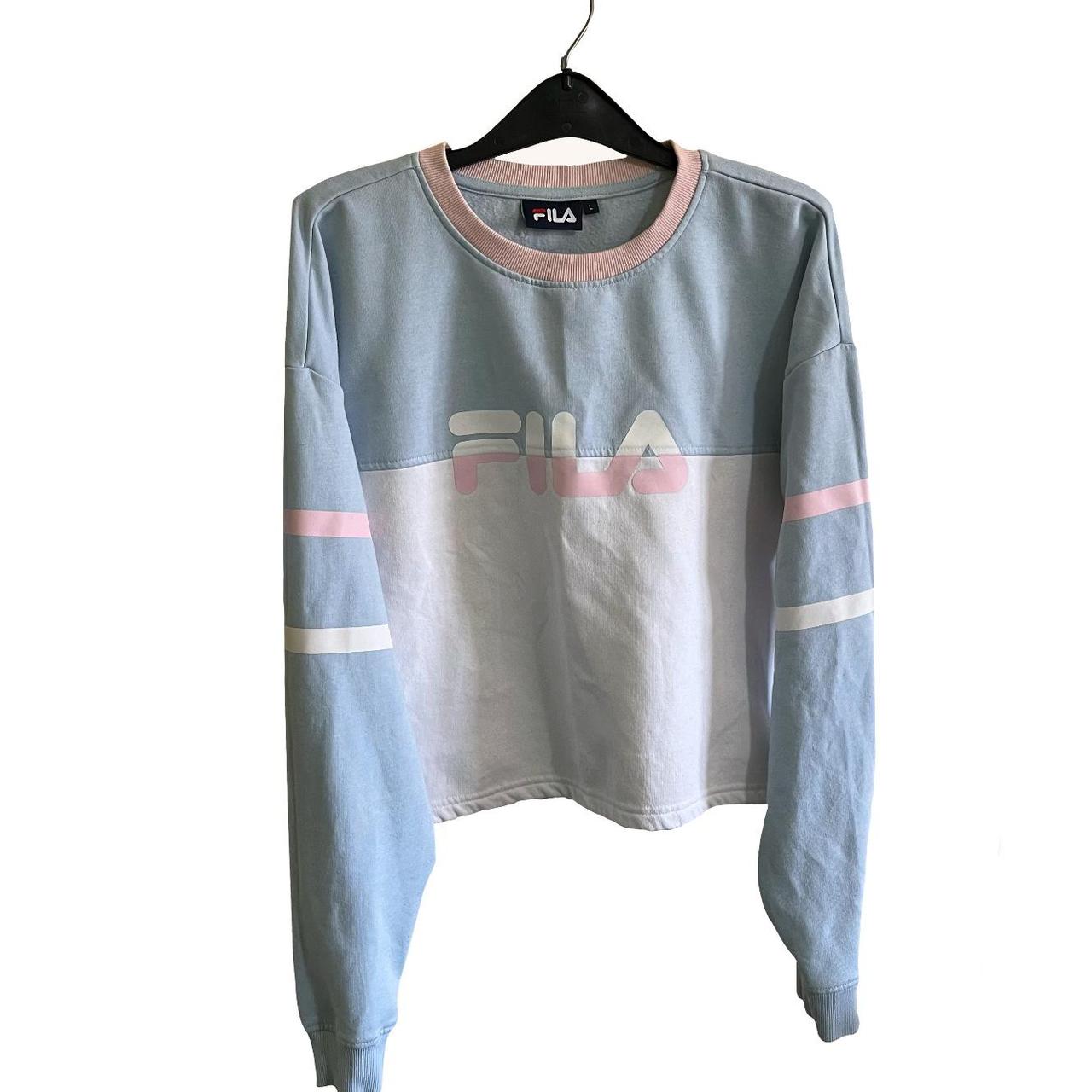 Really pretty white, baby blue and pink fila cropped... - Depop