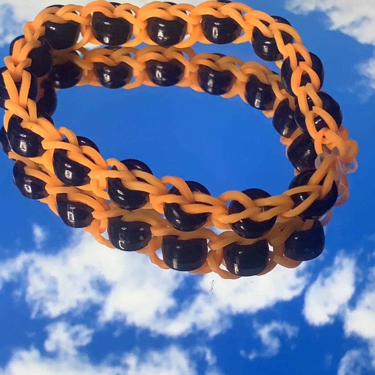 black and orange rainbowloom kandi dm me your size... - Depop