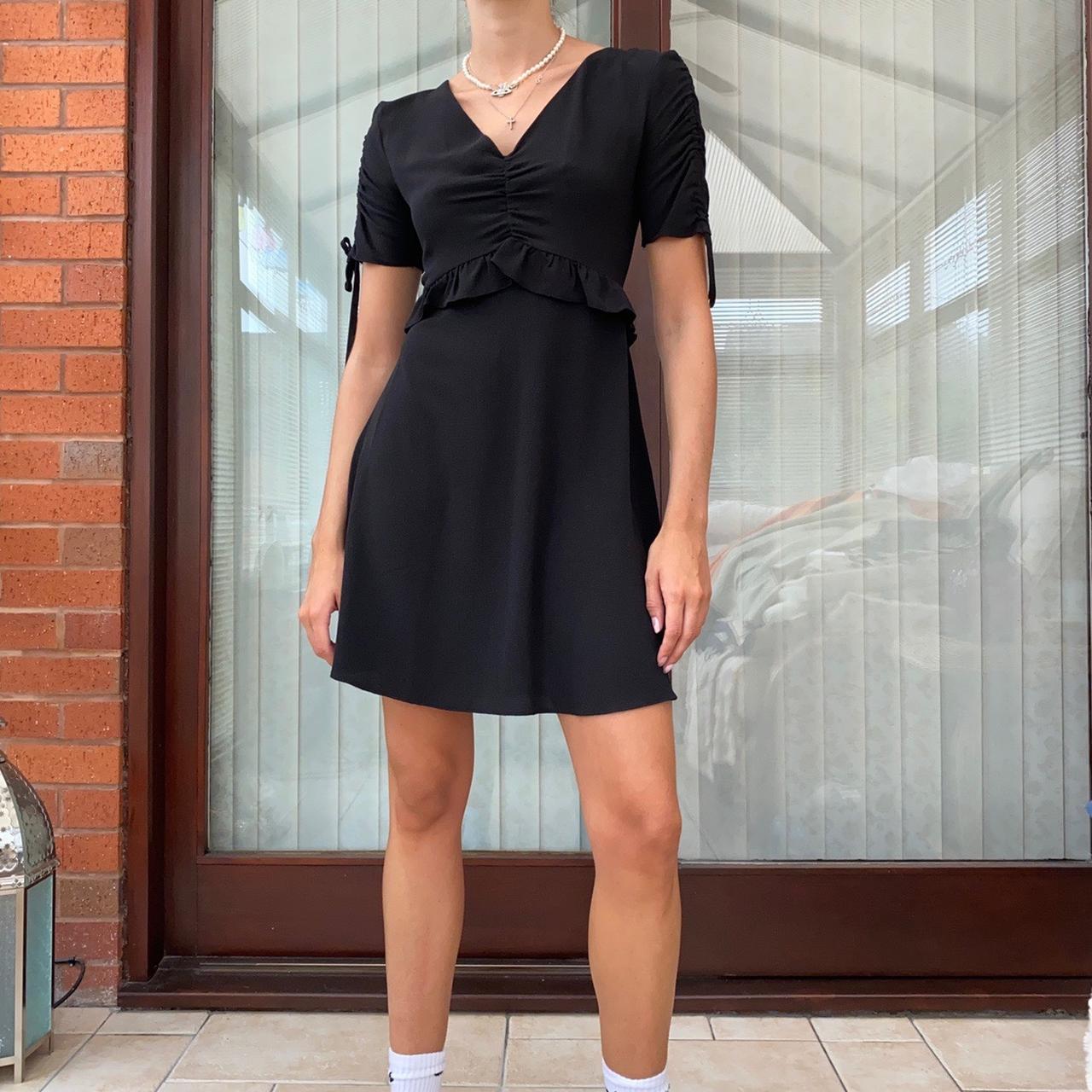 Cutest Asos black mini tea skater dress with ruffle... - Depop