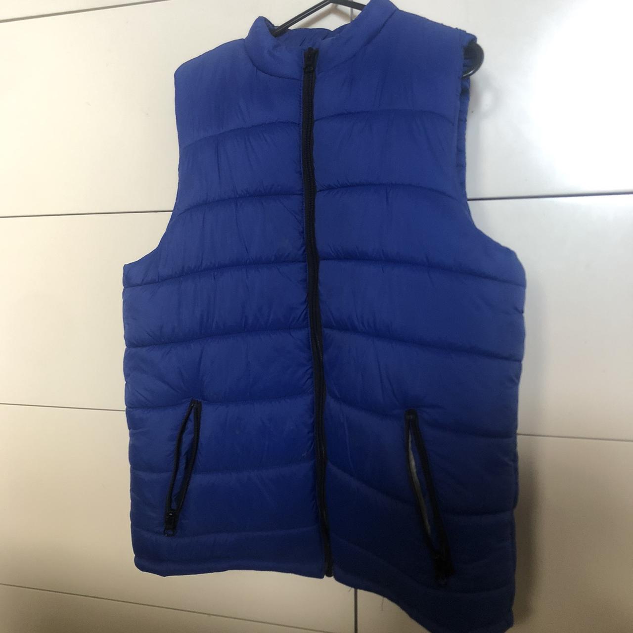 blue puffer vest with pockets and soft cotton... - Depop