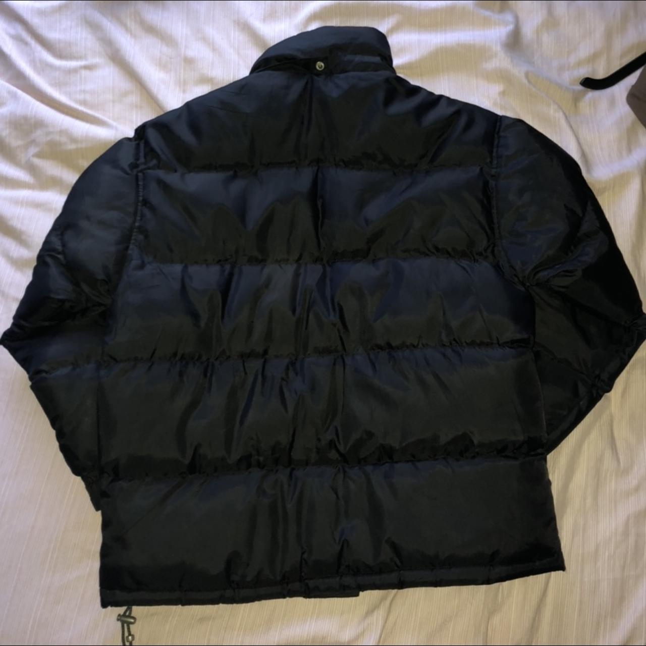 eisenegger black puffer jacket, has its wears... - Depop