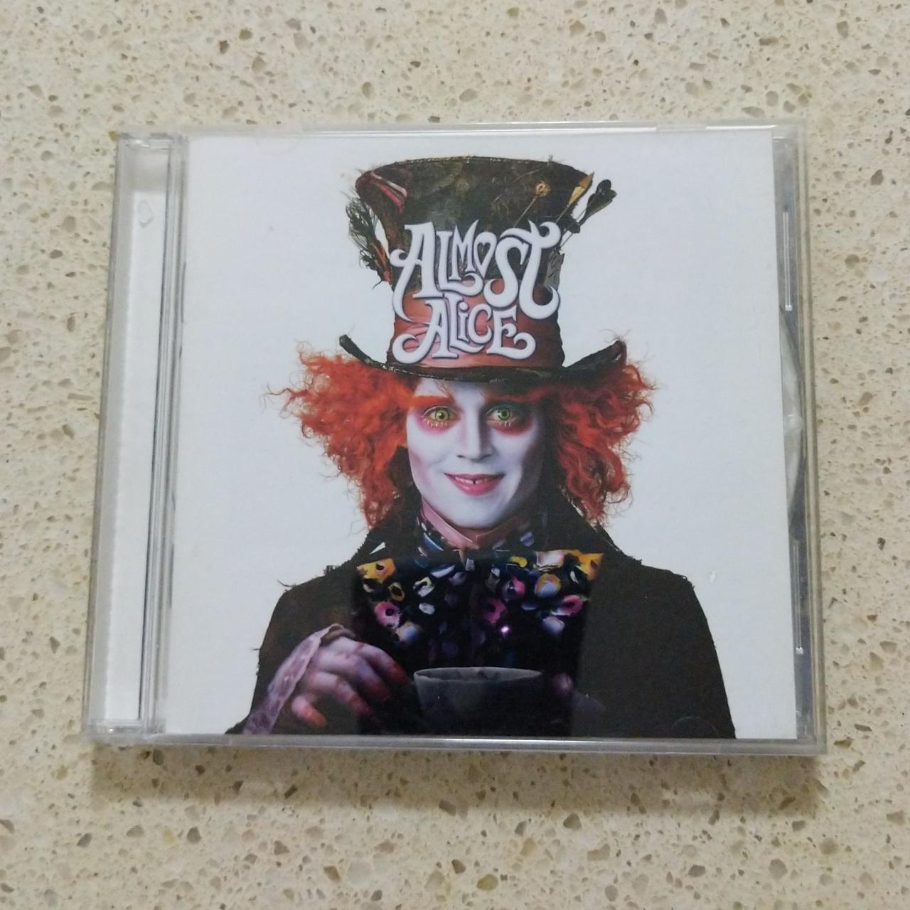 Almost Alice CD inspired by Alice in Wonderland... - Depop