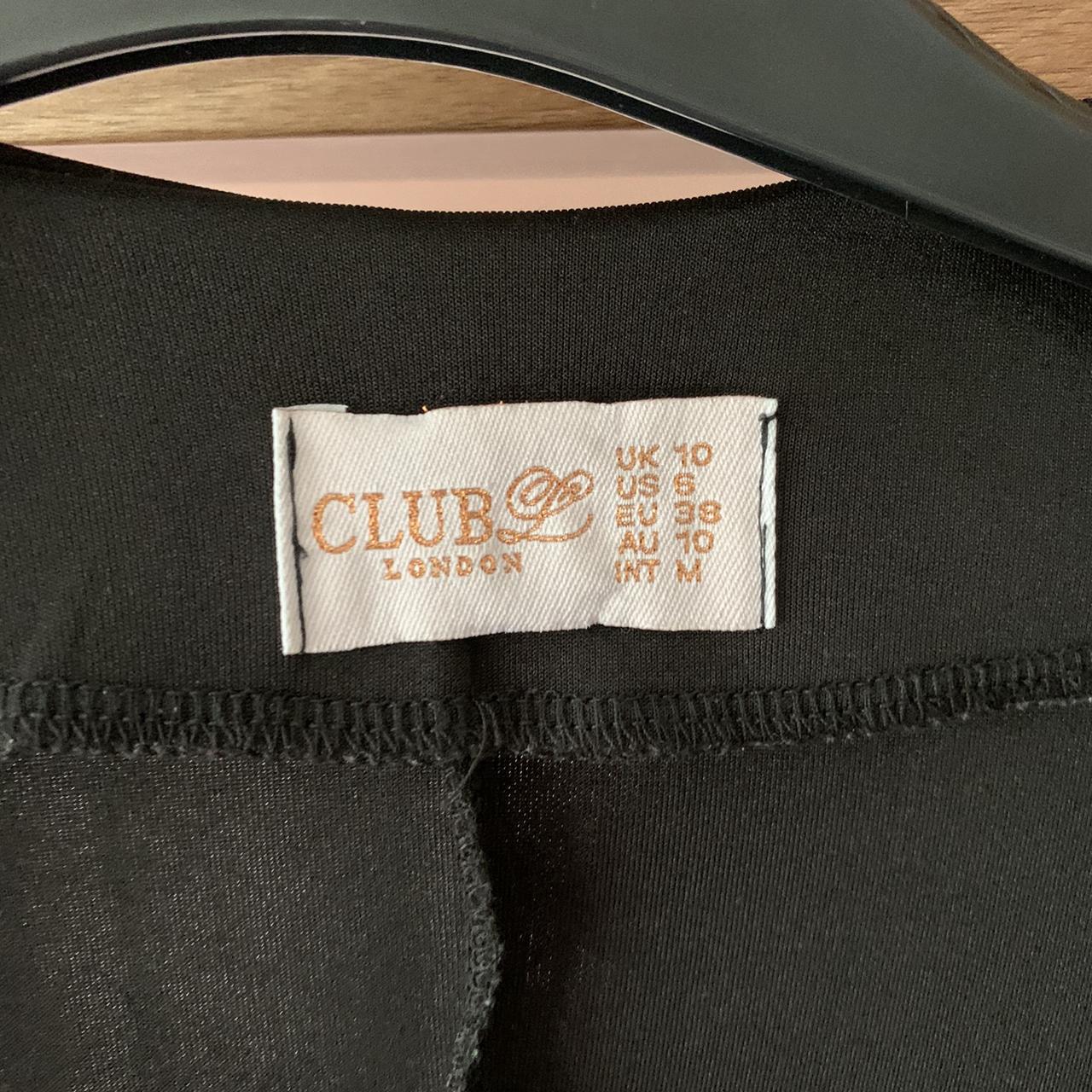 Club London black mini dress with deep plunge - so... - Depop