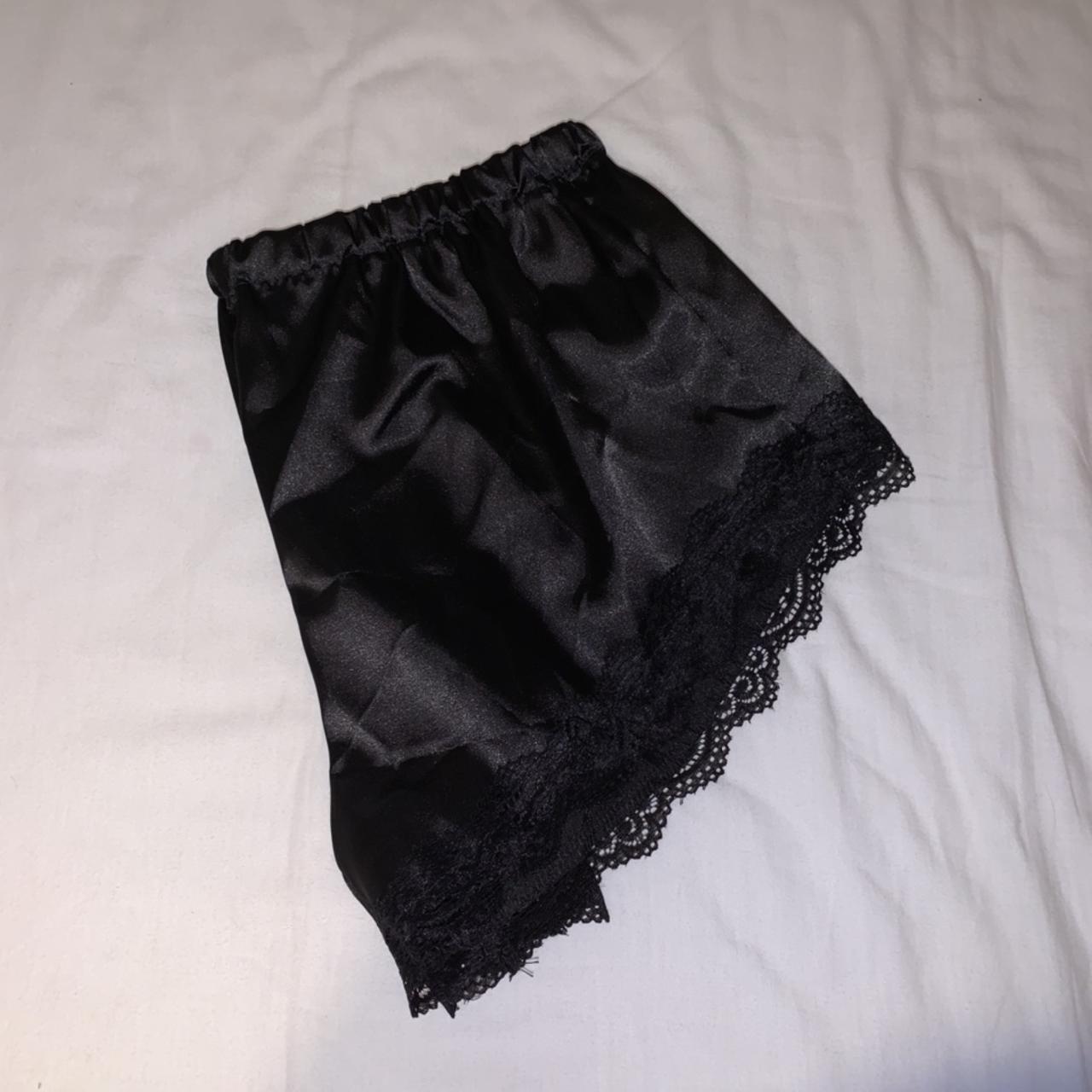 black and pink satin kind of feel short shorts with... - Depop