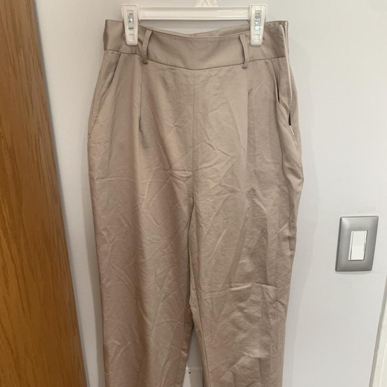 Silky cream colored pants! no stretch, good sized... - Depop