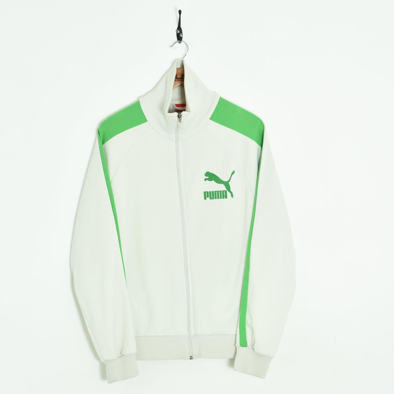 White Puma tracksuit top with printed logo and two... - Depop