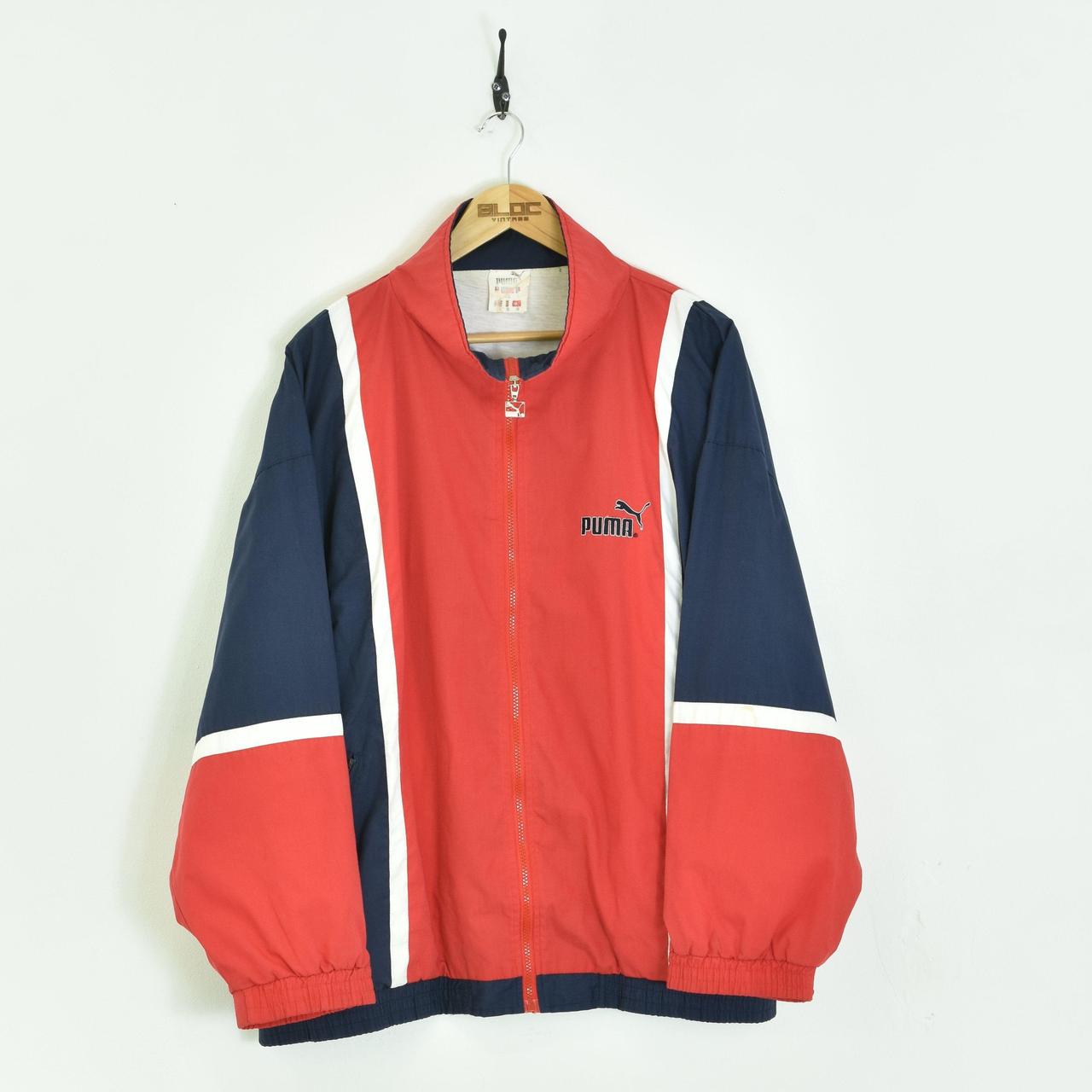 Red Puma shell jacket with embroidered logo and two... - Depop