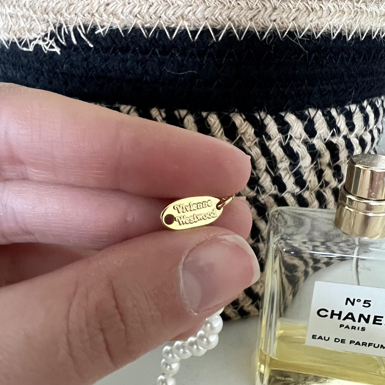 Gold Saturn and Pearl necklace😍 -FREE... - Depop