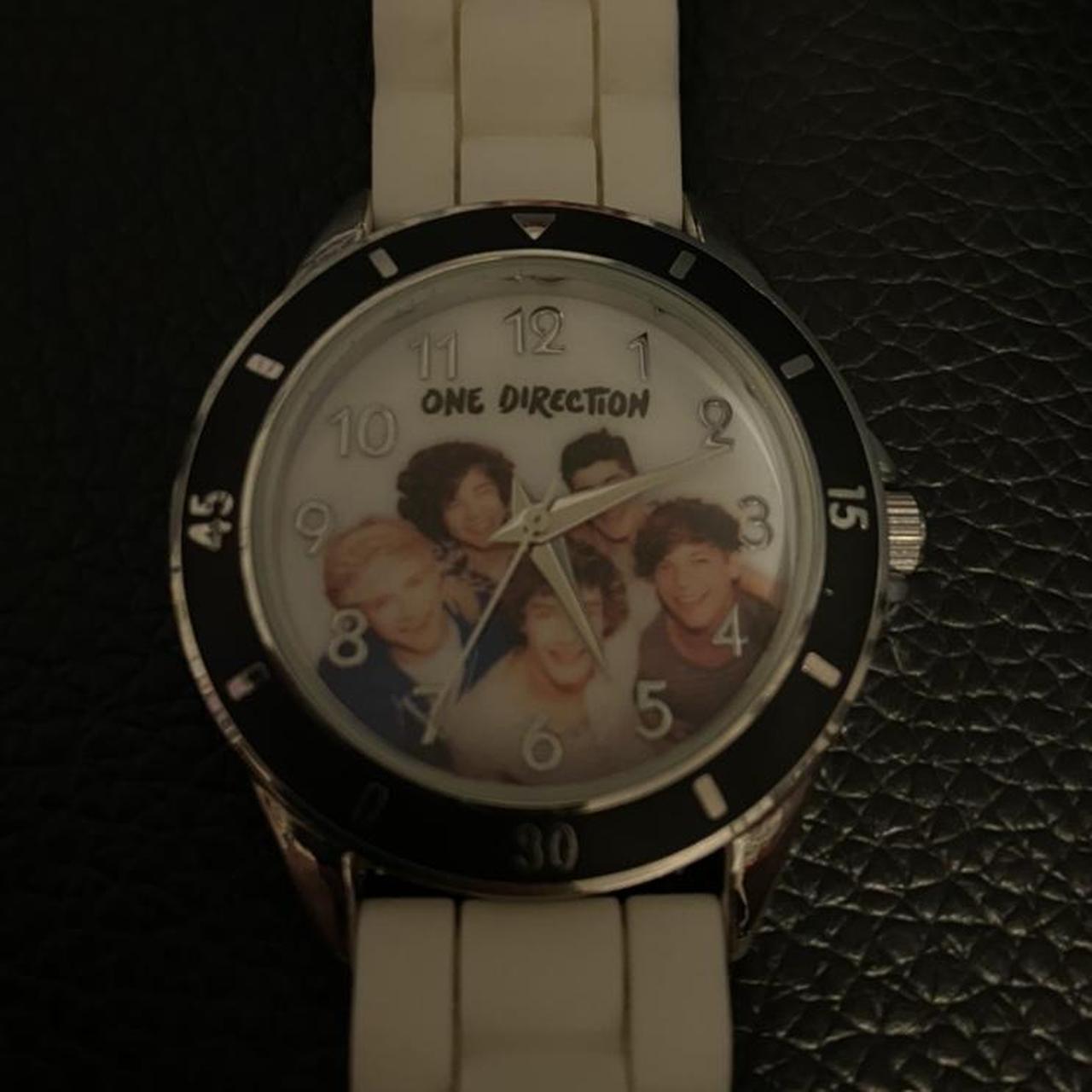 white one direction watch with box, needs new... - Depop