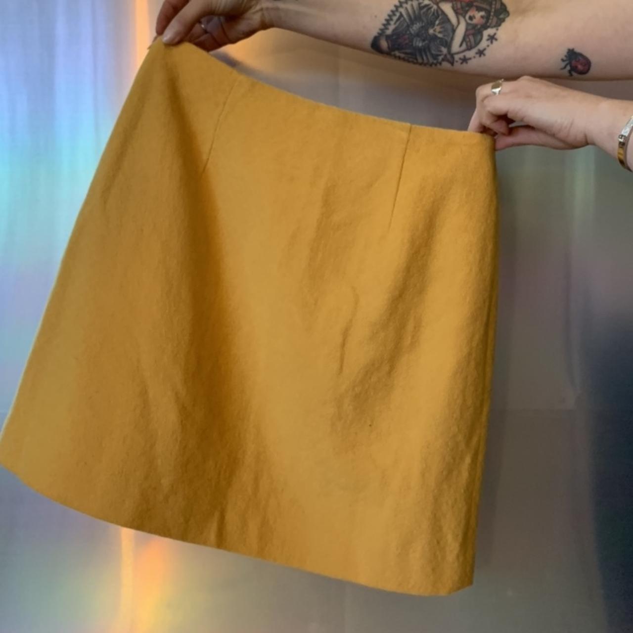 Vibrant yellow/mustard mini skirt. The skirt is a... - Depop