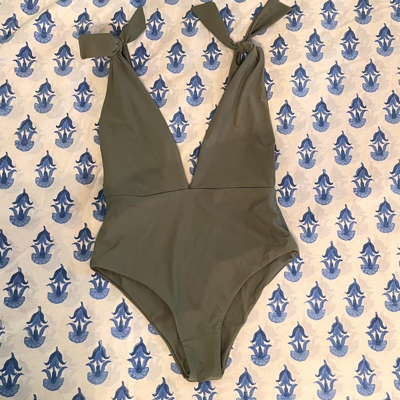 Green one piece swimsuit with tie strapped shoulders... - Depop