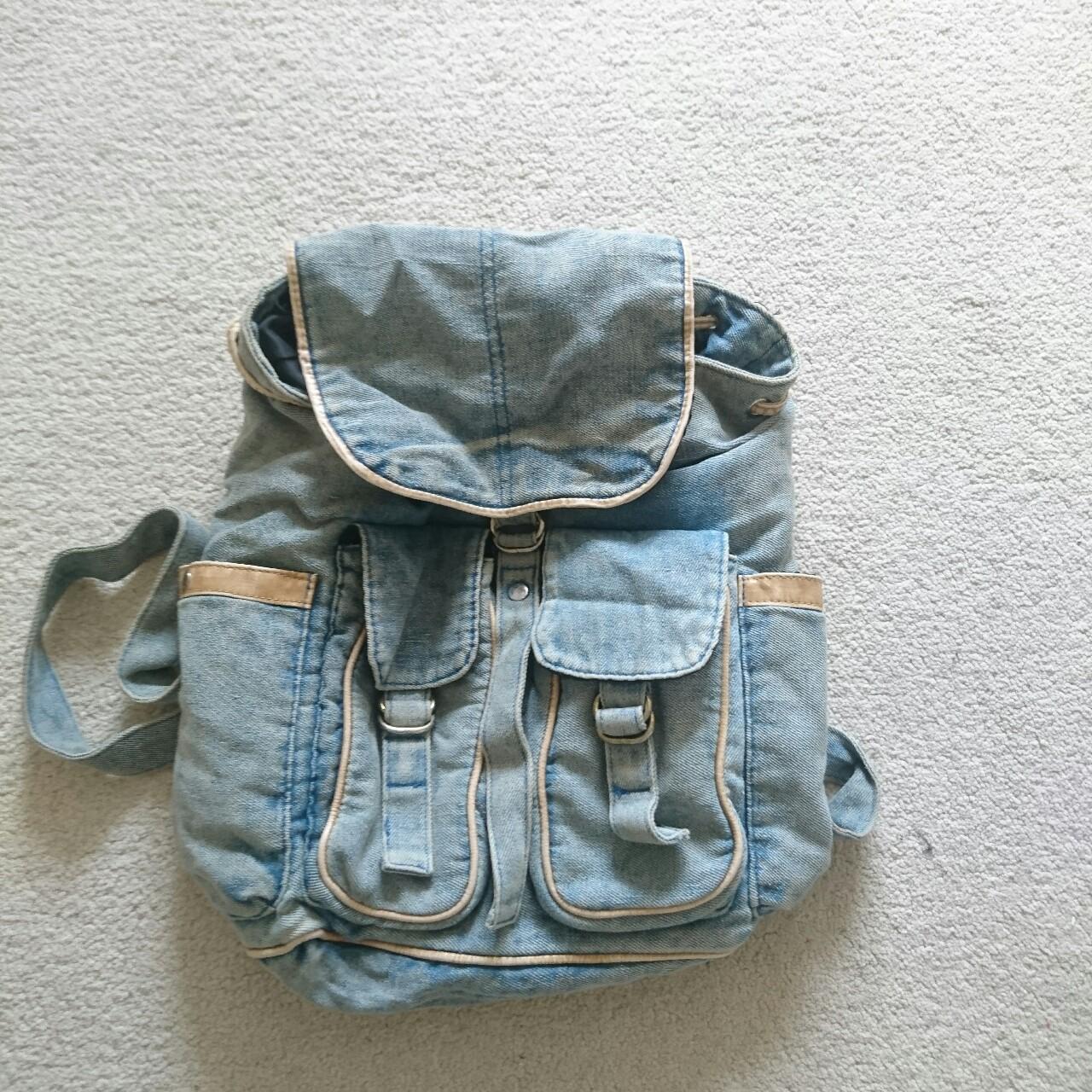 Topshop grungy denim rucksack with pockets. Hardly... - Depop
