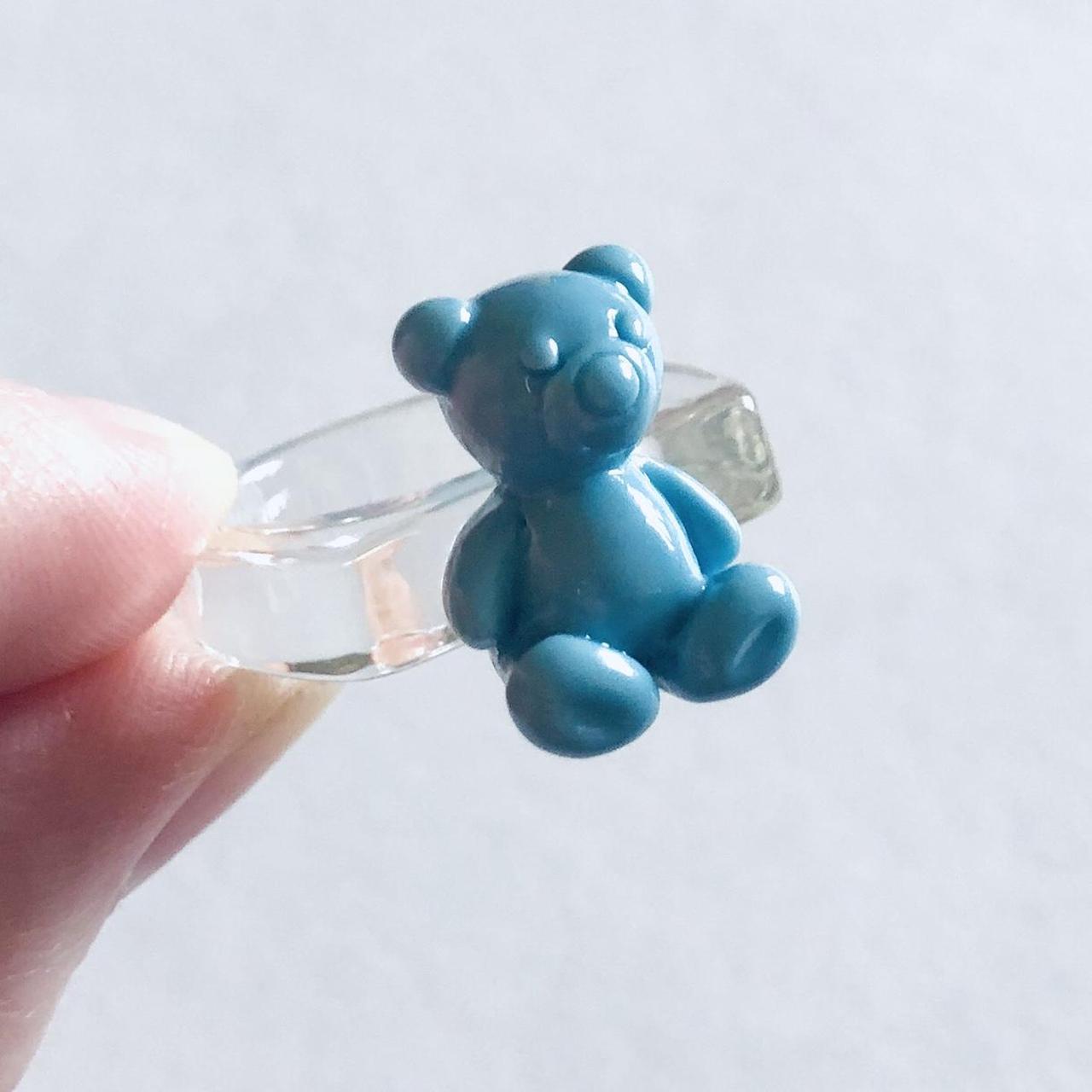 Teddy bear ring, on a clear see through resin ring... - Depop