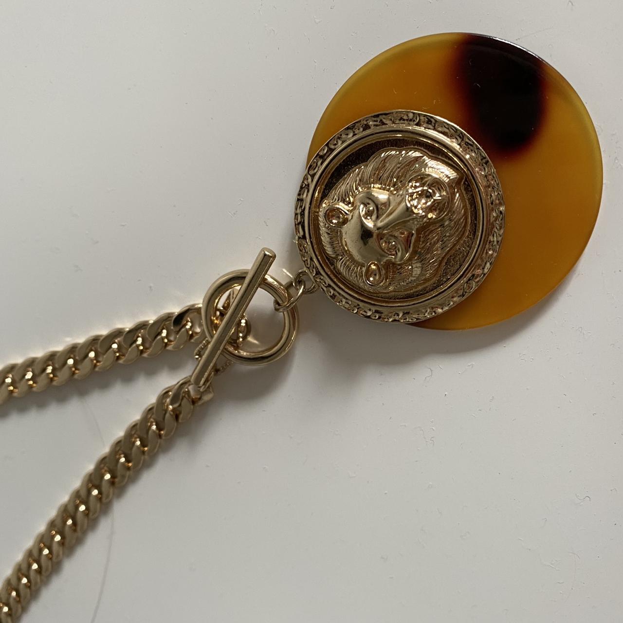 Gold lion chain necklace never worn and in perfect... - Depop