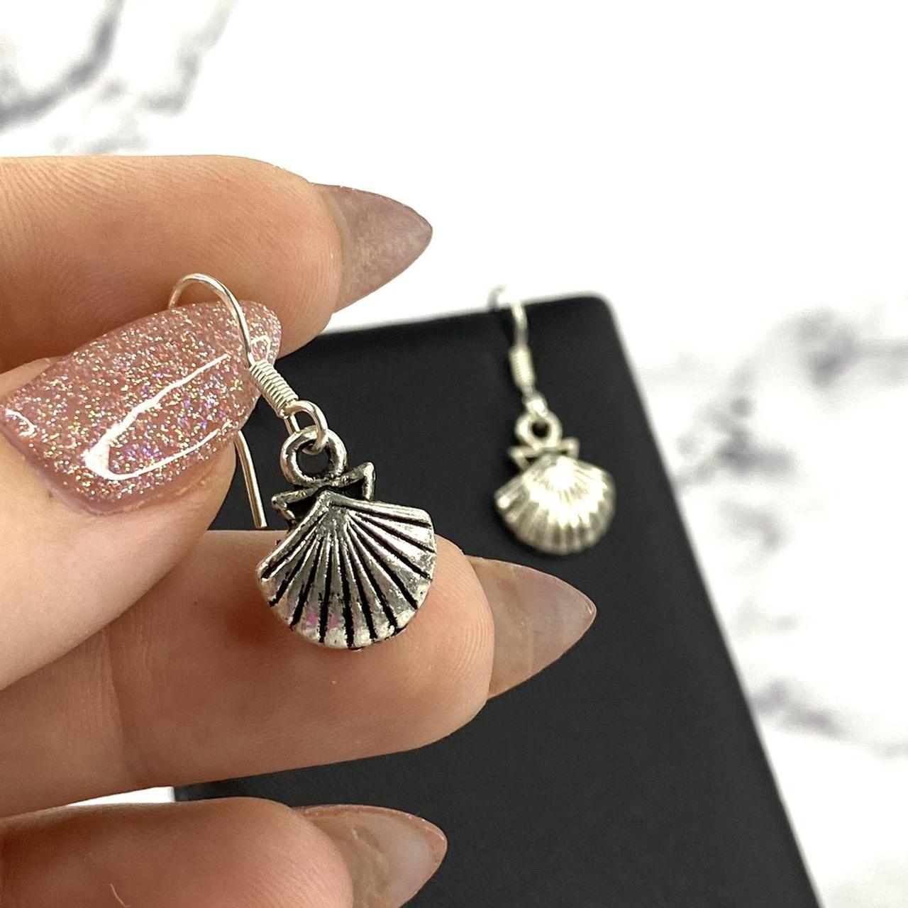 Cute little sea shell earrings 🖤🖤🖤 Instant buys are... - Depop