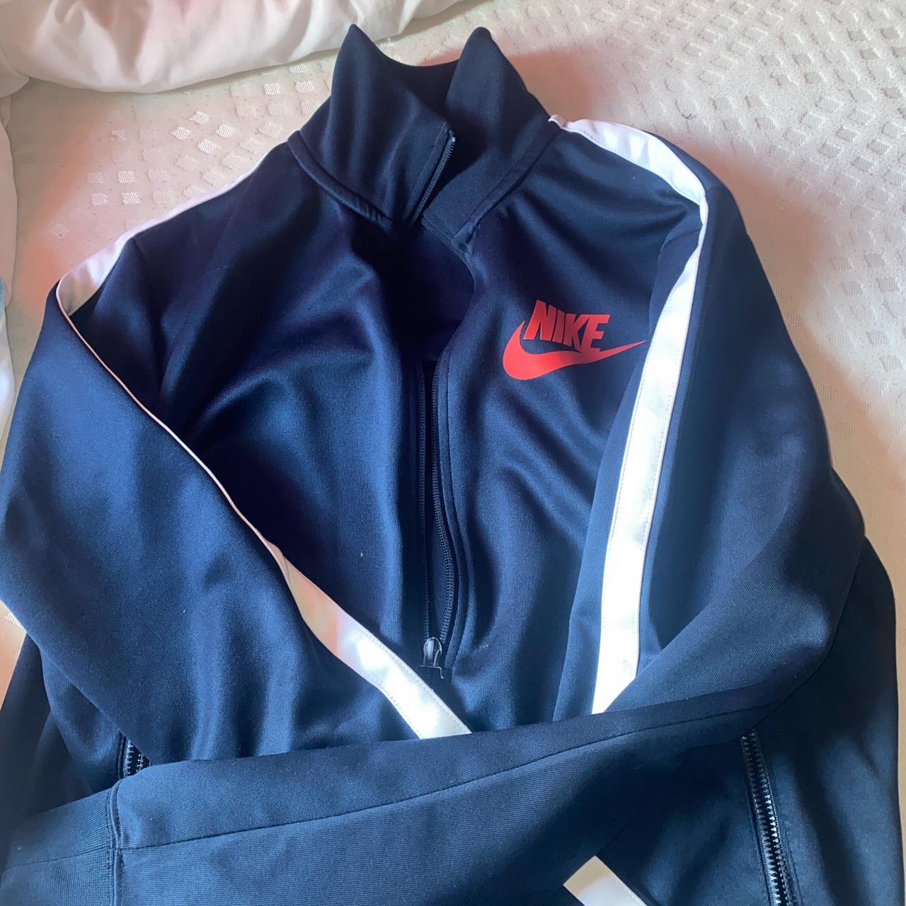 Blue Nike jacket In perfect condition except for... - Depop