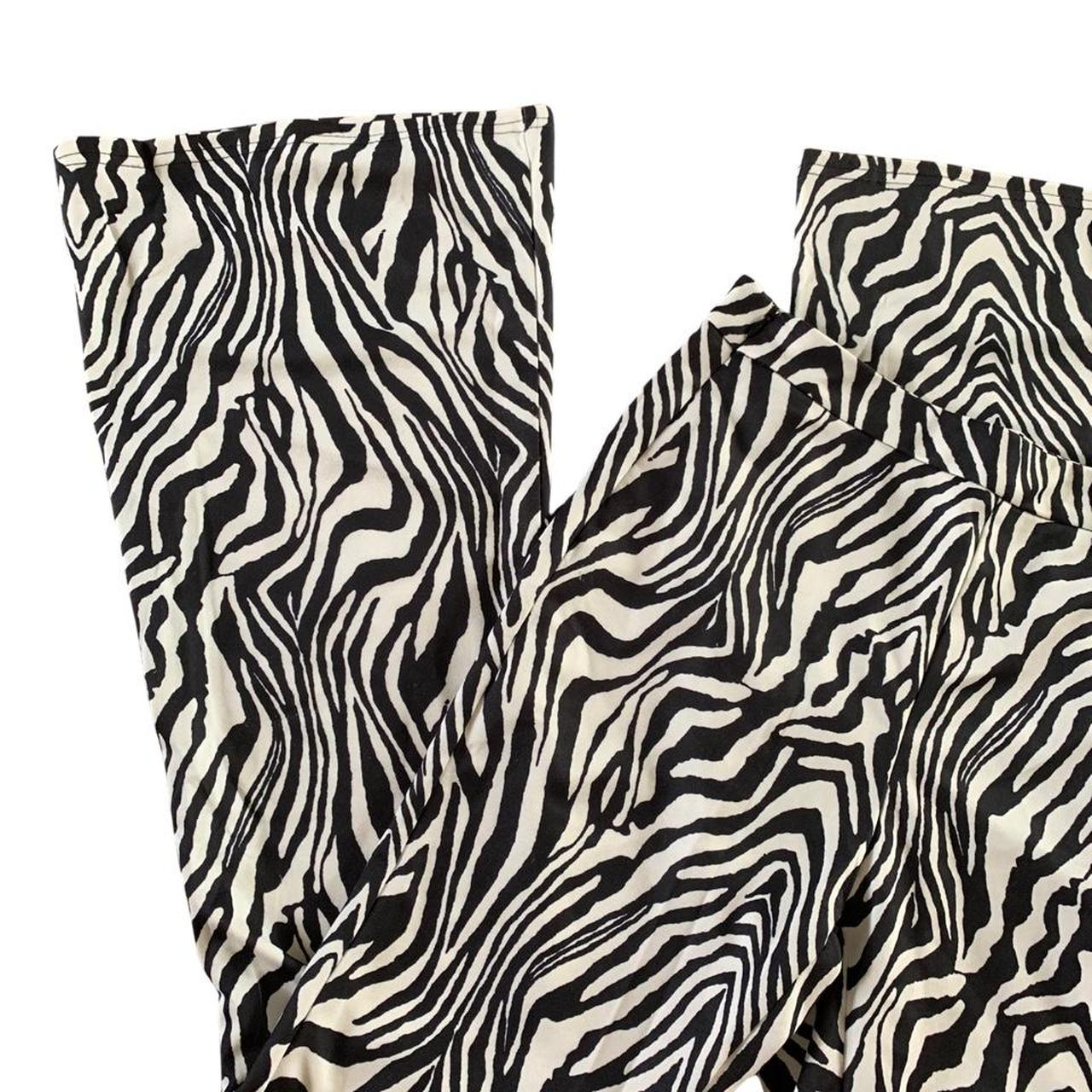 Zebra flares Side in closed zipper Worn once,... - Depop