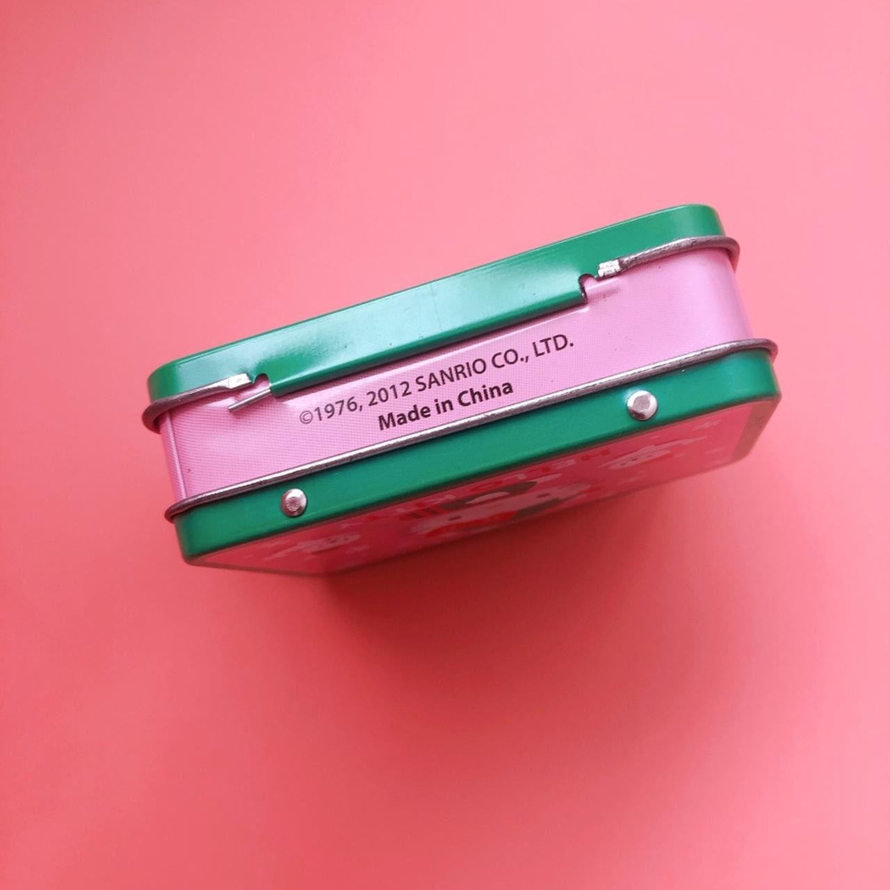 A mini tin box around 2 1/2 inches across. Shows... - Depop