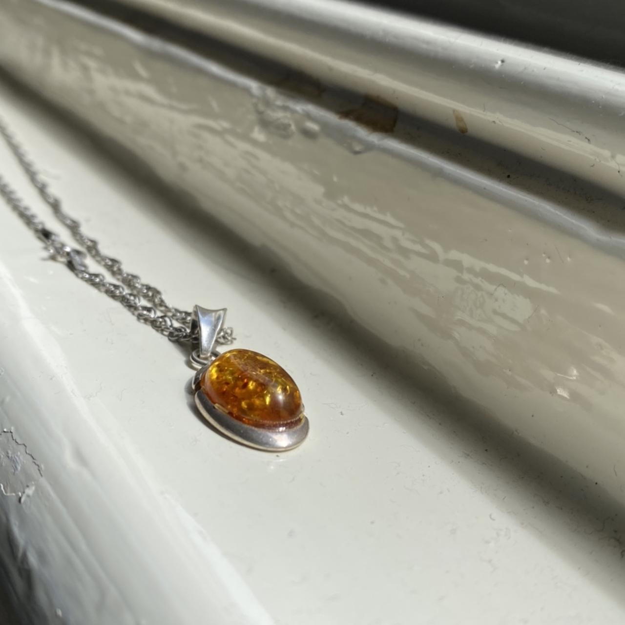 Stunning, authentic oval amber House of Amber charm,... - Depop