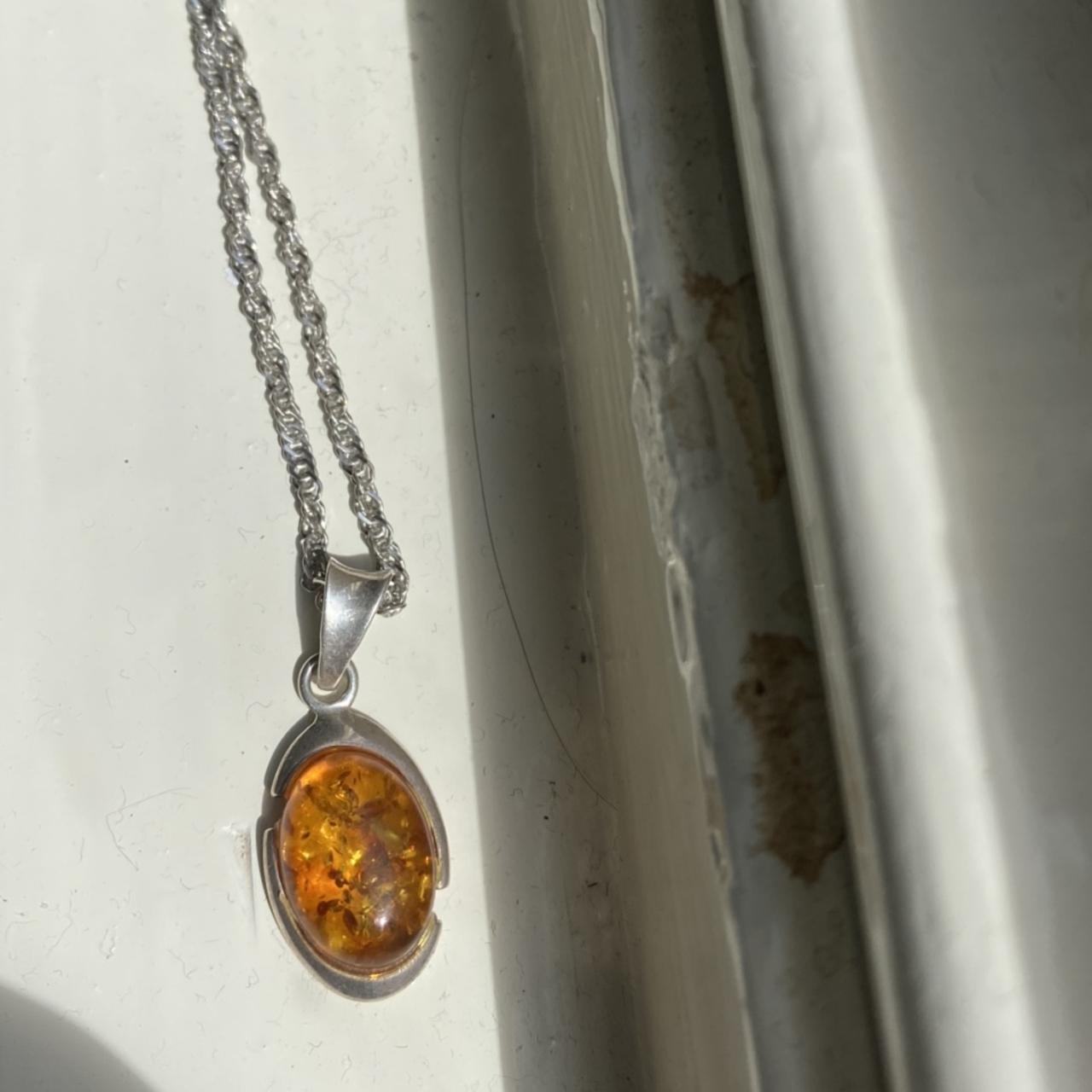 Stunning, authentic oval amber House of Amber charm,... - Depop