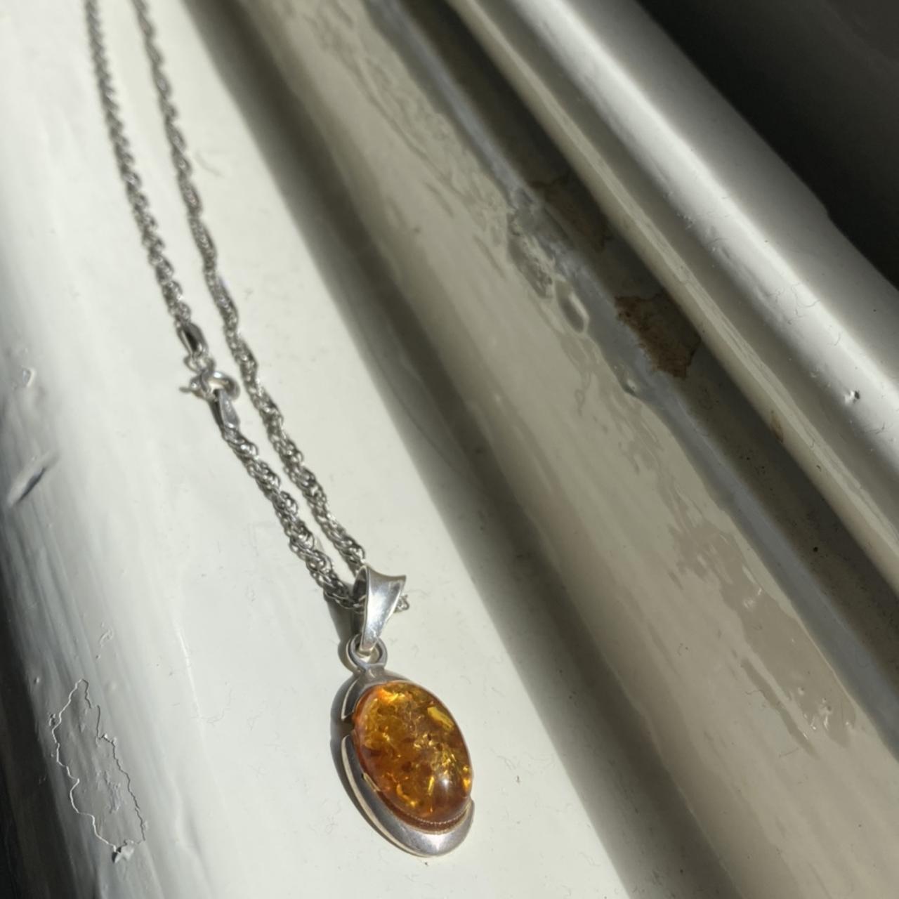 Stunning, authentic oval amber House of Amber charm,... - Depop