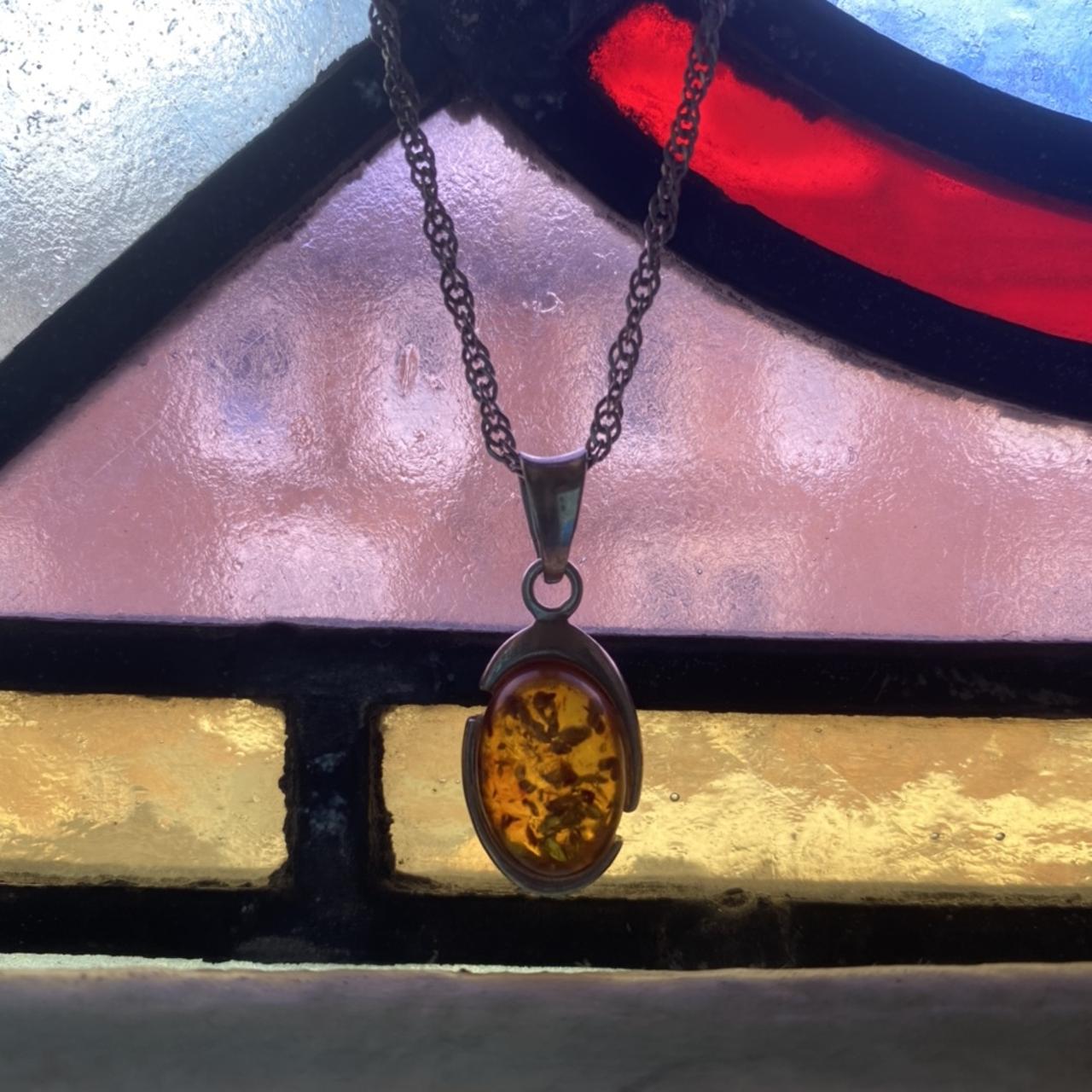 Stunning, authentic oval amber House of Amber charm,... - Depop