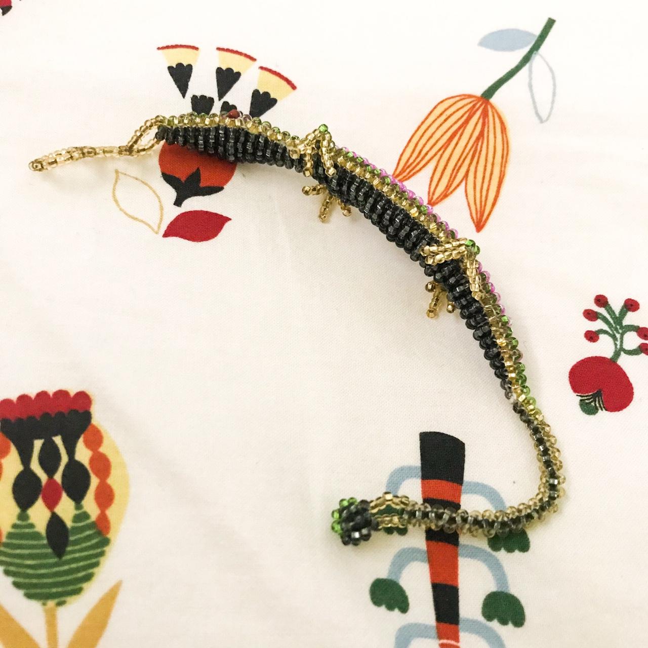 Purple and green beaded lizard bracelet. Hardly worn... - Depop