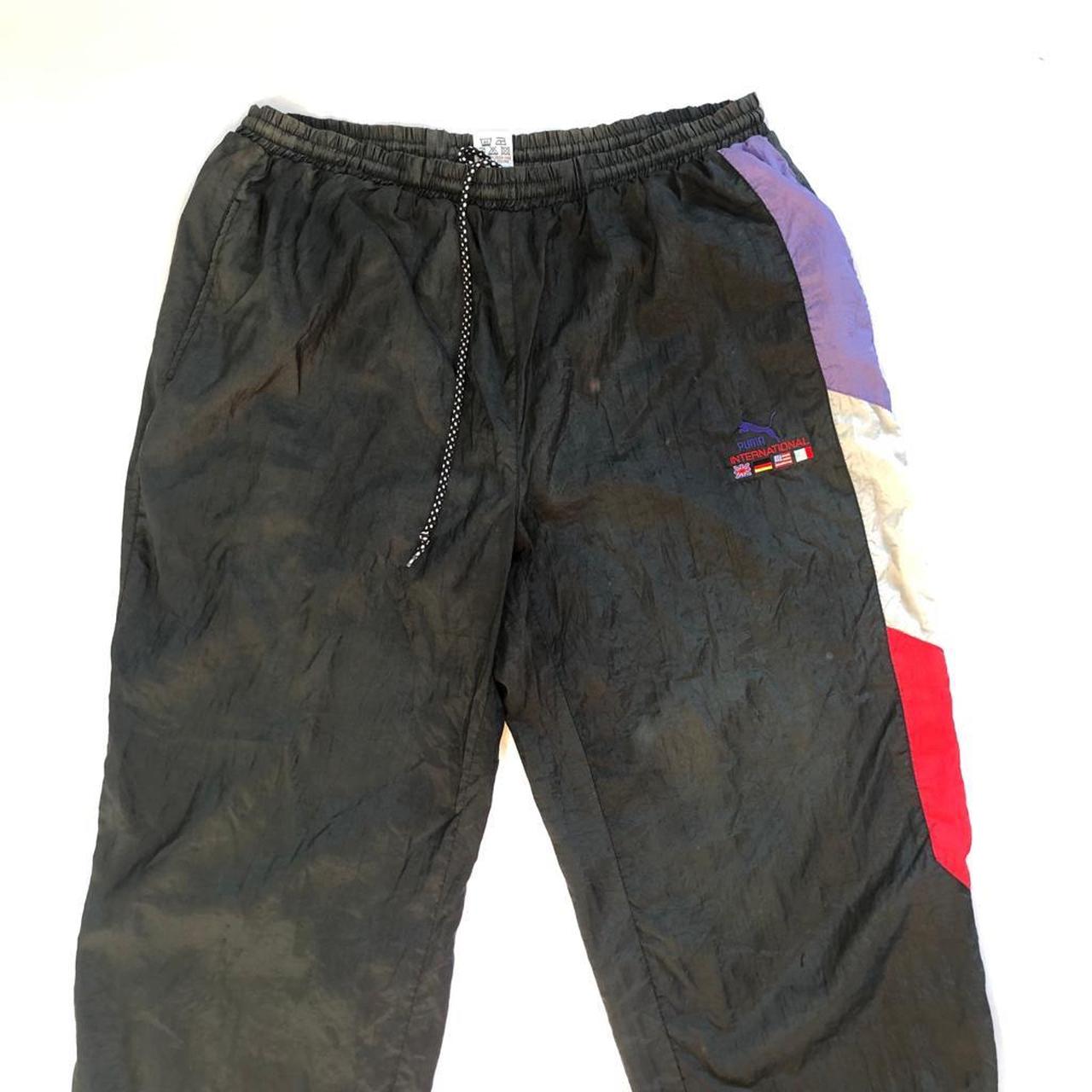 Puma International tracksuit bottoms sweatpants... - Depop