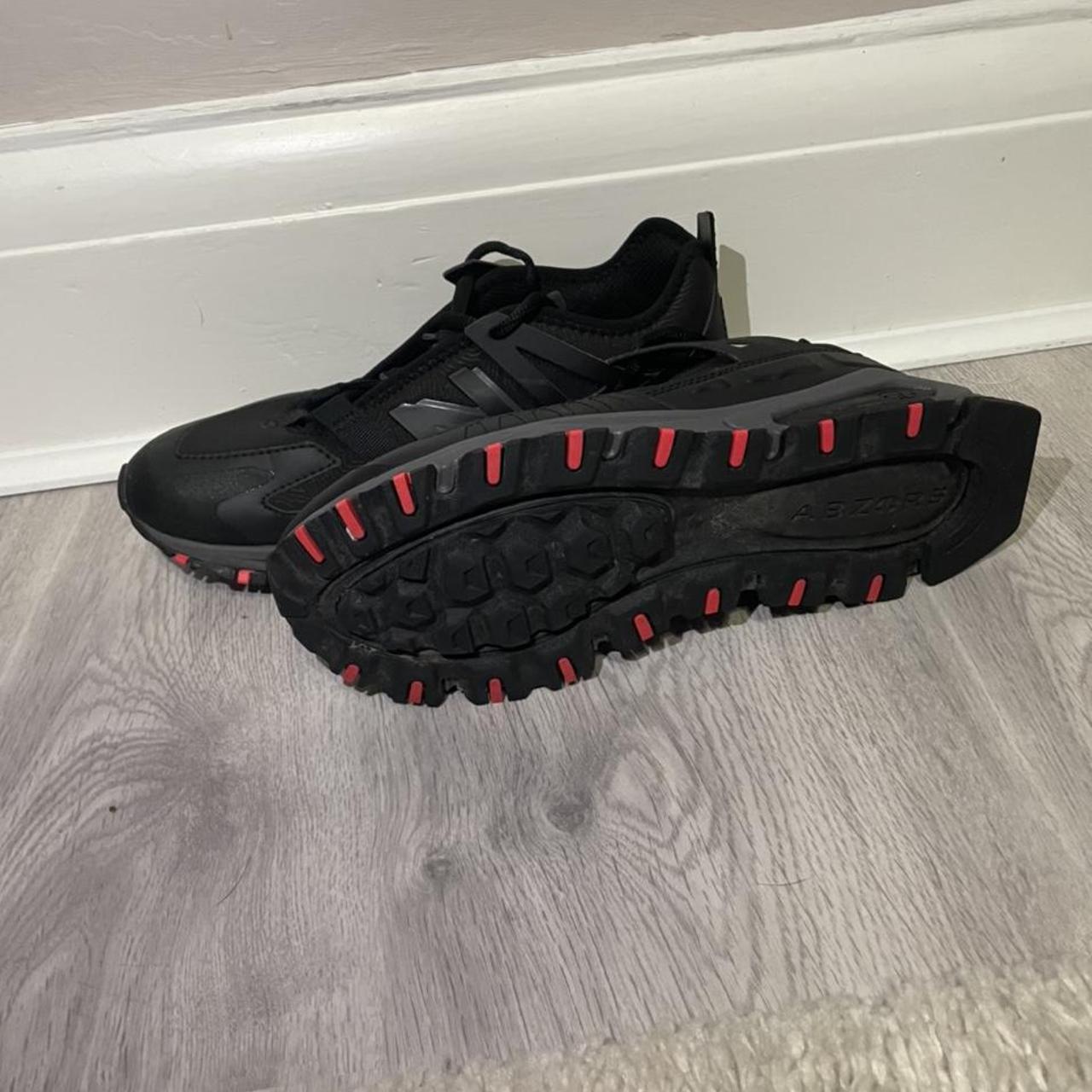 Black and red new balance trainers. Hardly been worn... - Depop