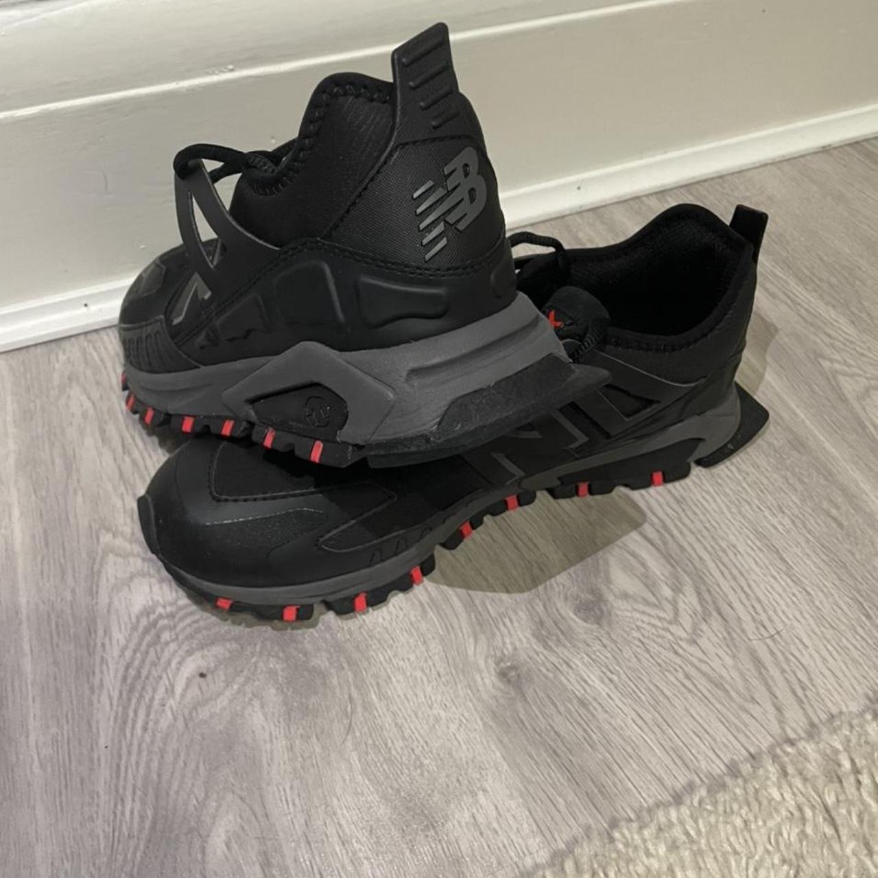 Black and red new balance trainers. Hardly been worn... - Depop