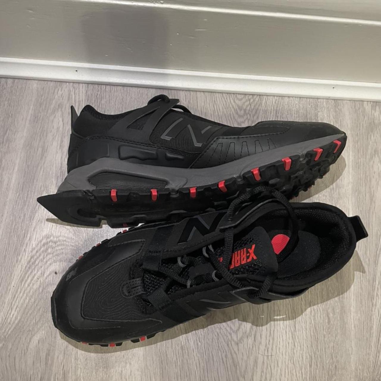 Black and red new balance trainers. Hardly been worn... - Depop