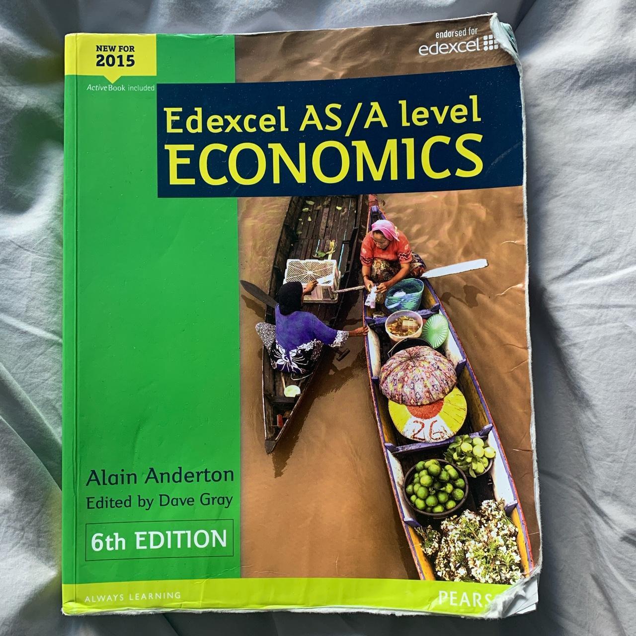 Pearson EDEXCL economics A-level textbook. Has both... - Depop