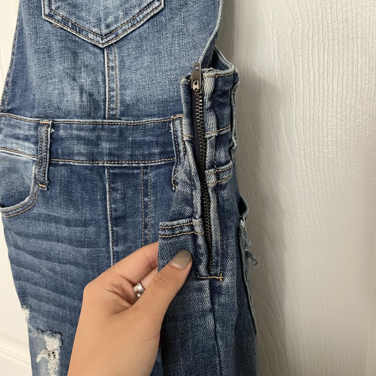 skinny distressed long overalls with zippers on the... - Depop