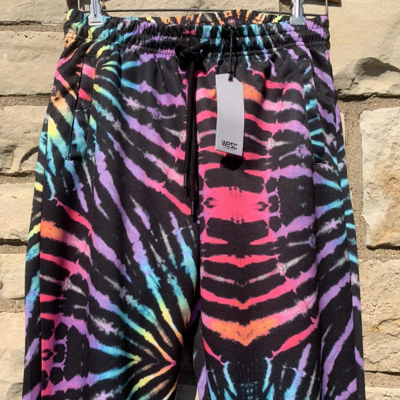WESC Rainbow tie dye jogger pants Unisex... - Depop