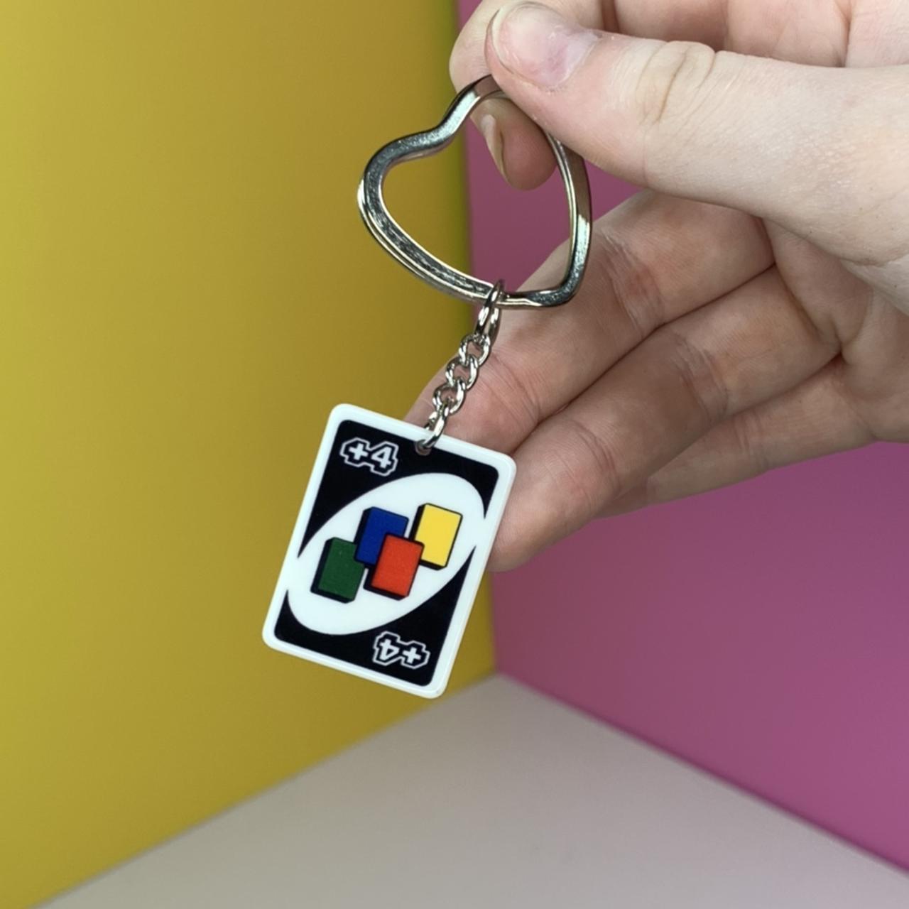 Draw 4 / plus 4 uno card key ring in the shape of a... - Depop