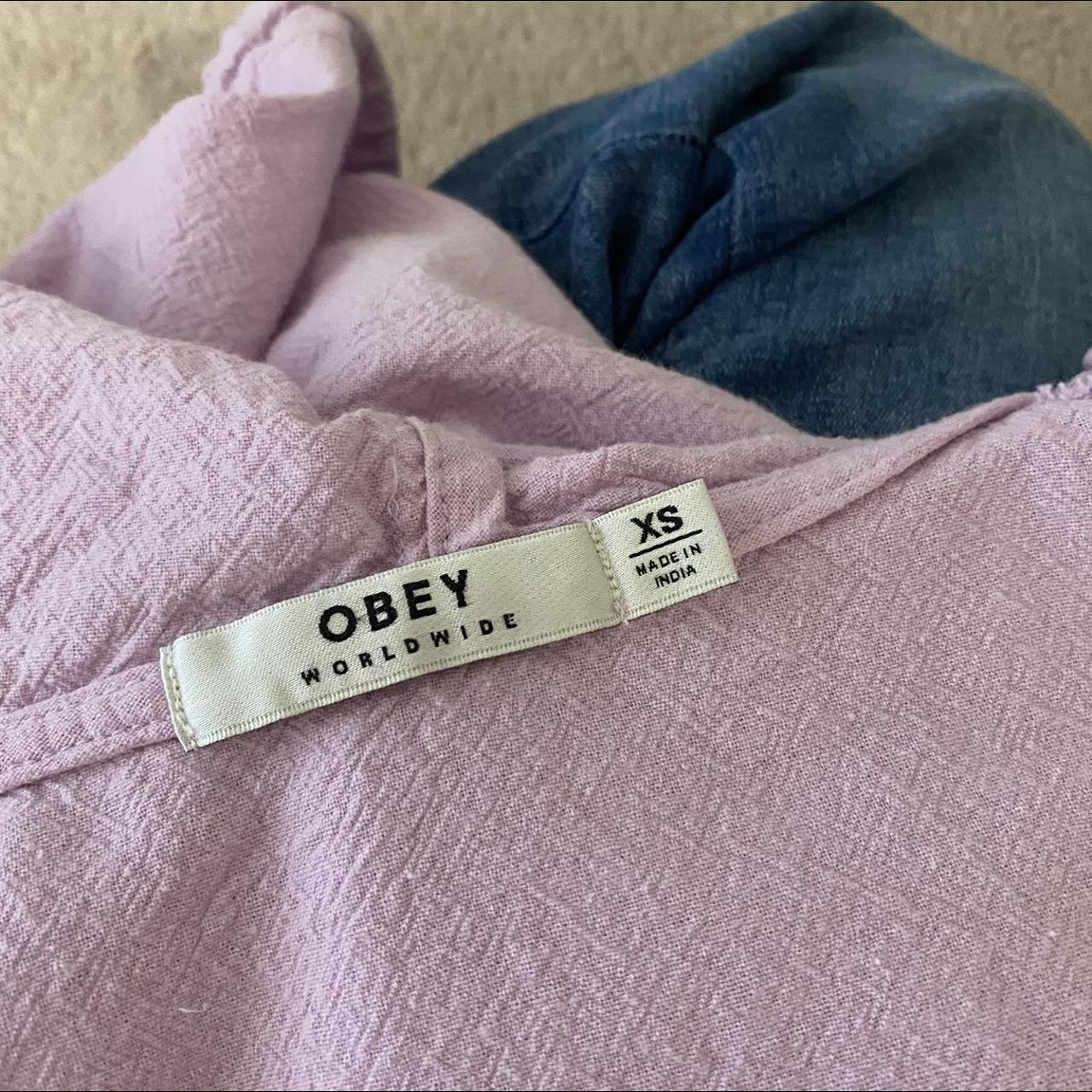 Obey worldwide lavender wind breaker. Has a hood.... - Depop
