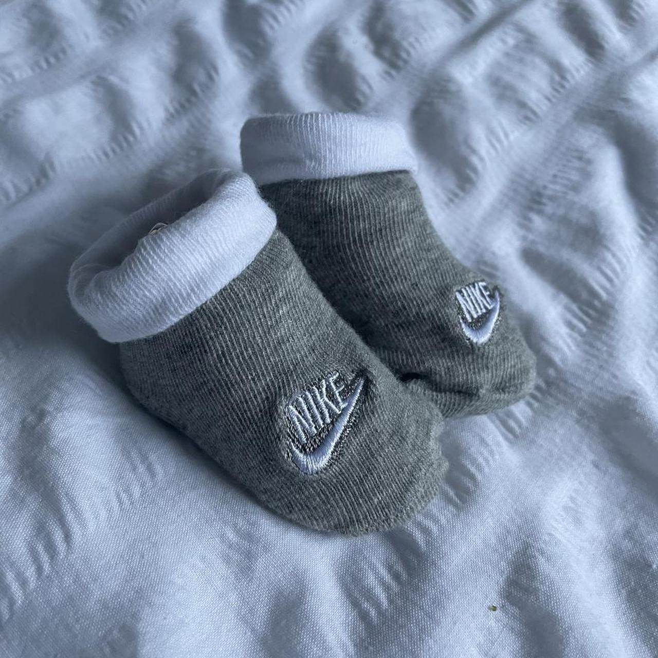Newborn Nike booties, brand new.. 2 pairs included.... - Depop
