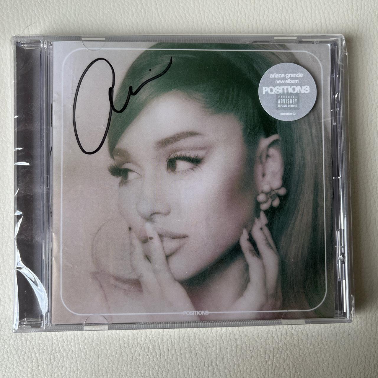 ariana grande signed positons CD - still in original... - Depop