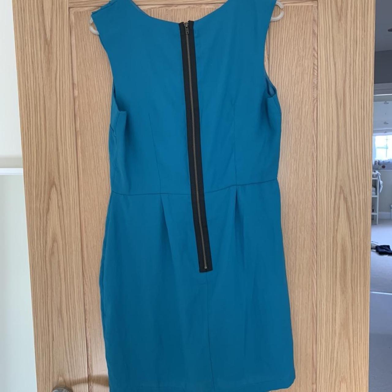 Amazing teal mini dress with zip back detail. Only... - Depop