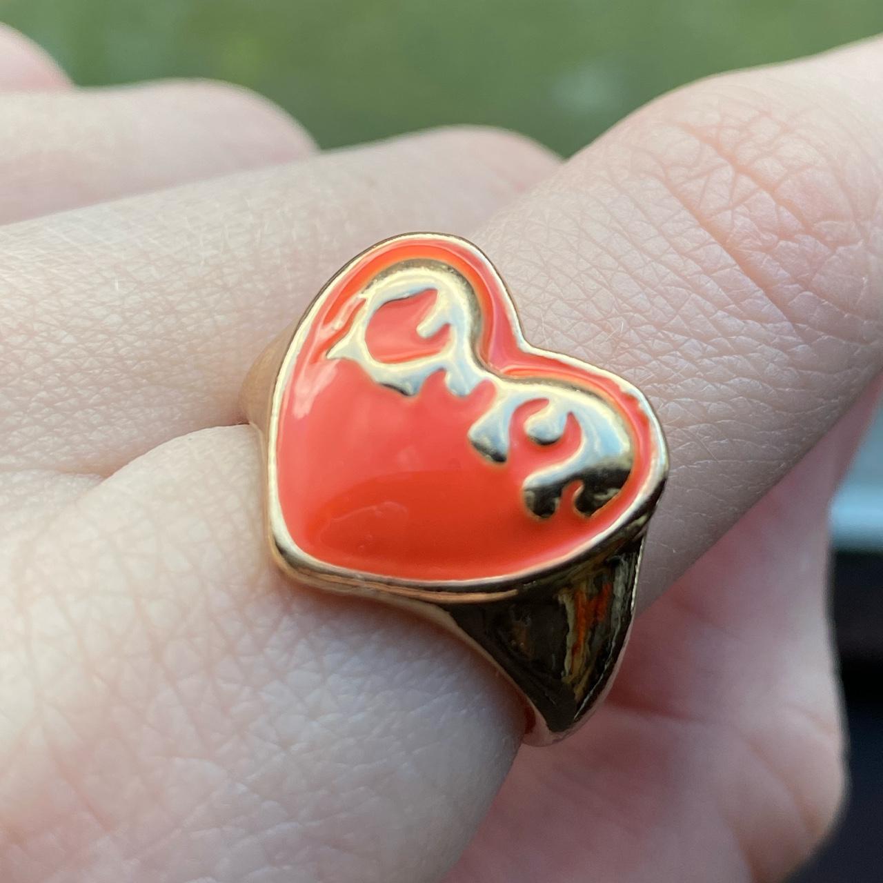 Stunning Gold and orange toned burning heart chunky... - Depop